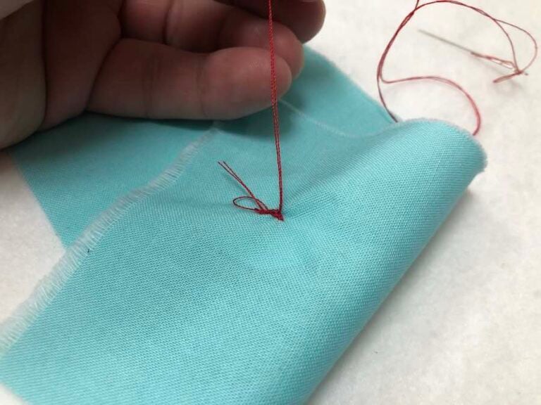 How to Sew a Two-hole Button By Hand