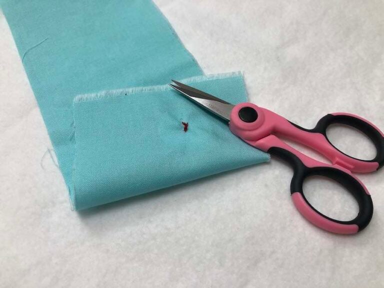 How to Sew a Two-hole Button By Hand