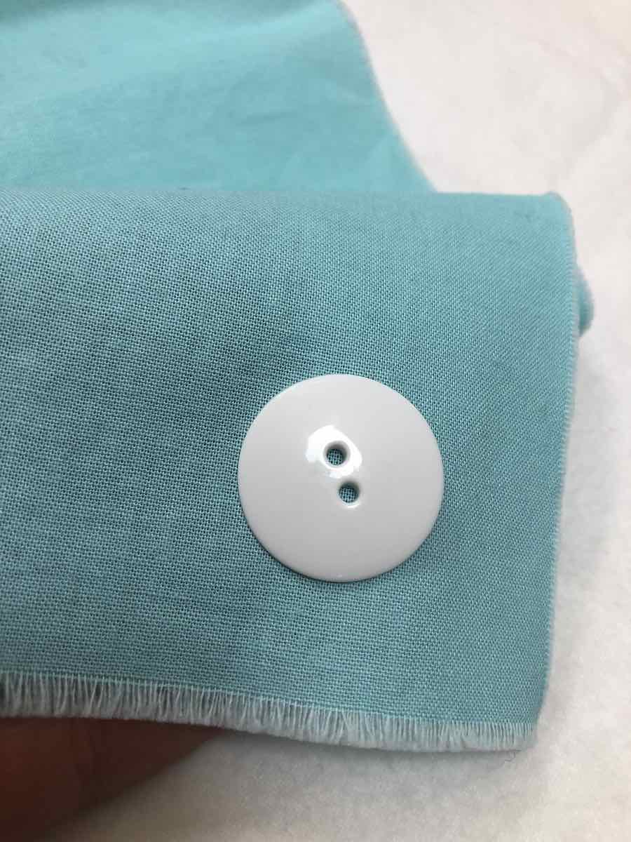 How to Sew a Two-hole Button By Hand